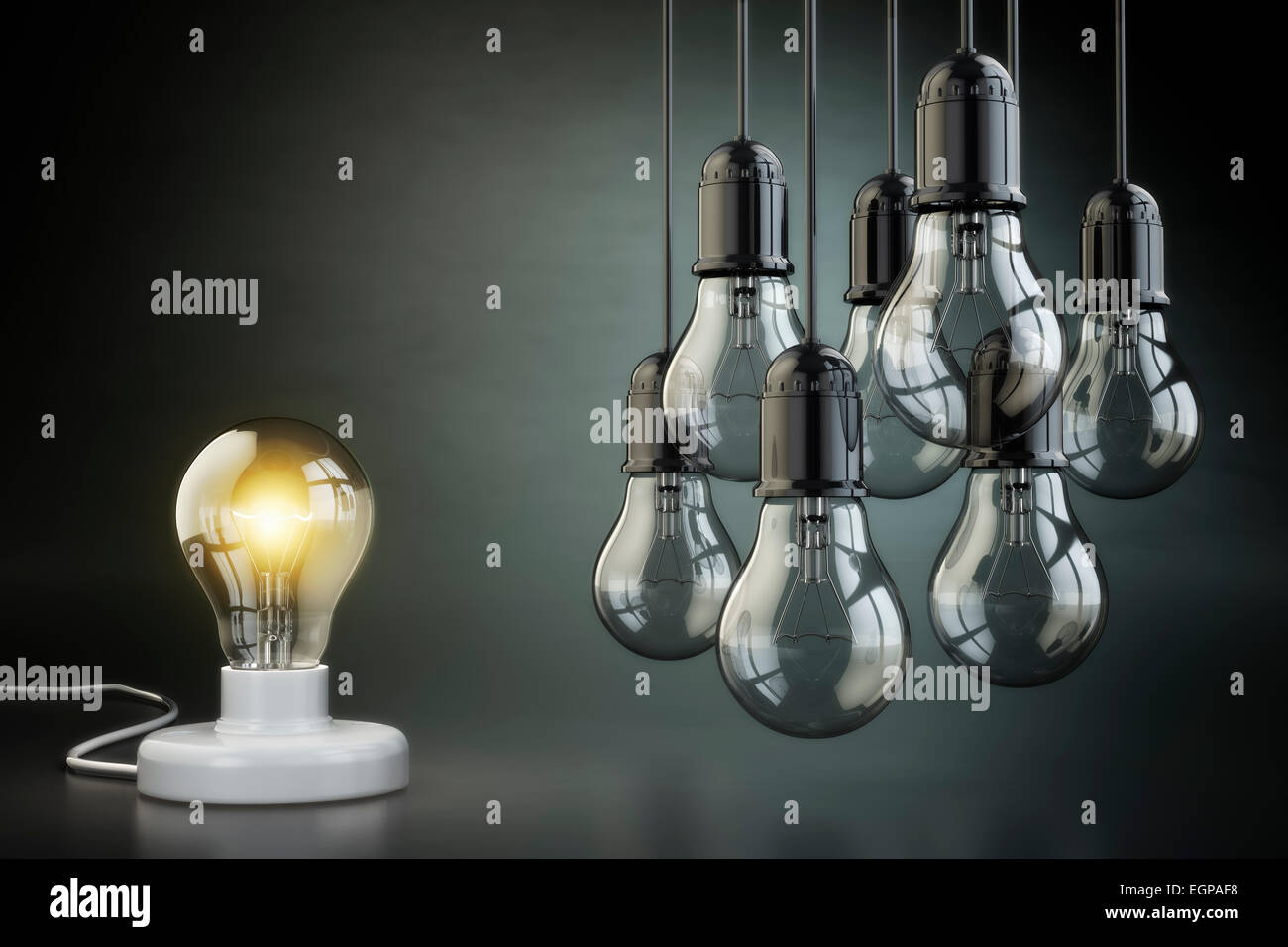 Idea or leadership concept. Group of lightbulbs on the black background ...
