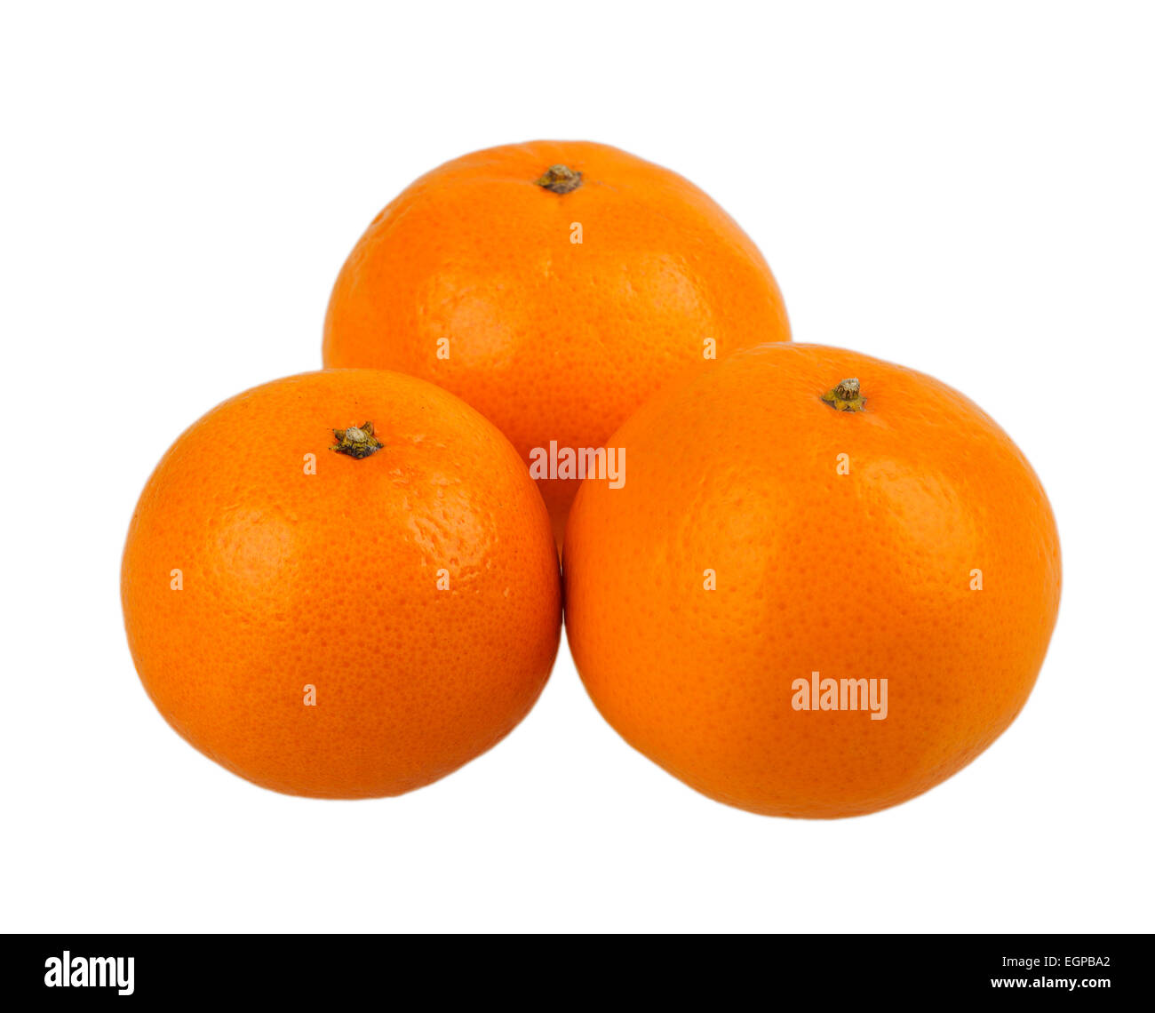 three oranges isolated on white background Stock Photo - Alamy