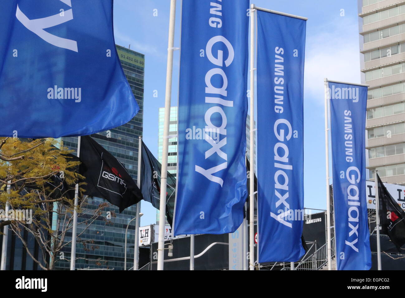 Barcelona, Spain. 28th Feb, 2015. Flags of the exhibition organisers ...