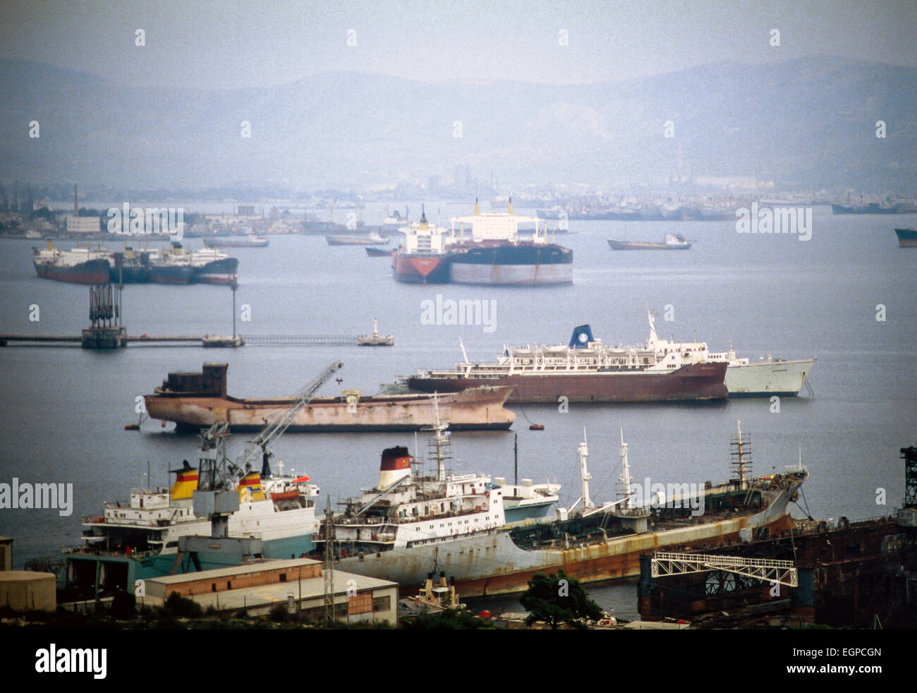 Ships graveyard in the port of Piraeus, Greece Stock Photo - Alamy