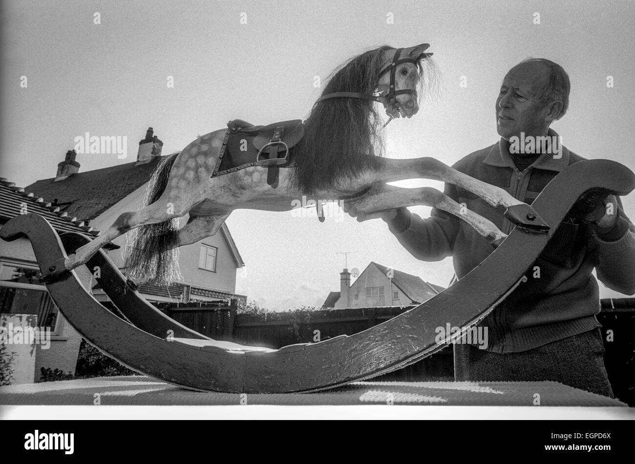 70-year old Clive Green, maker and restorer of rocking horses Stock ...