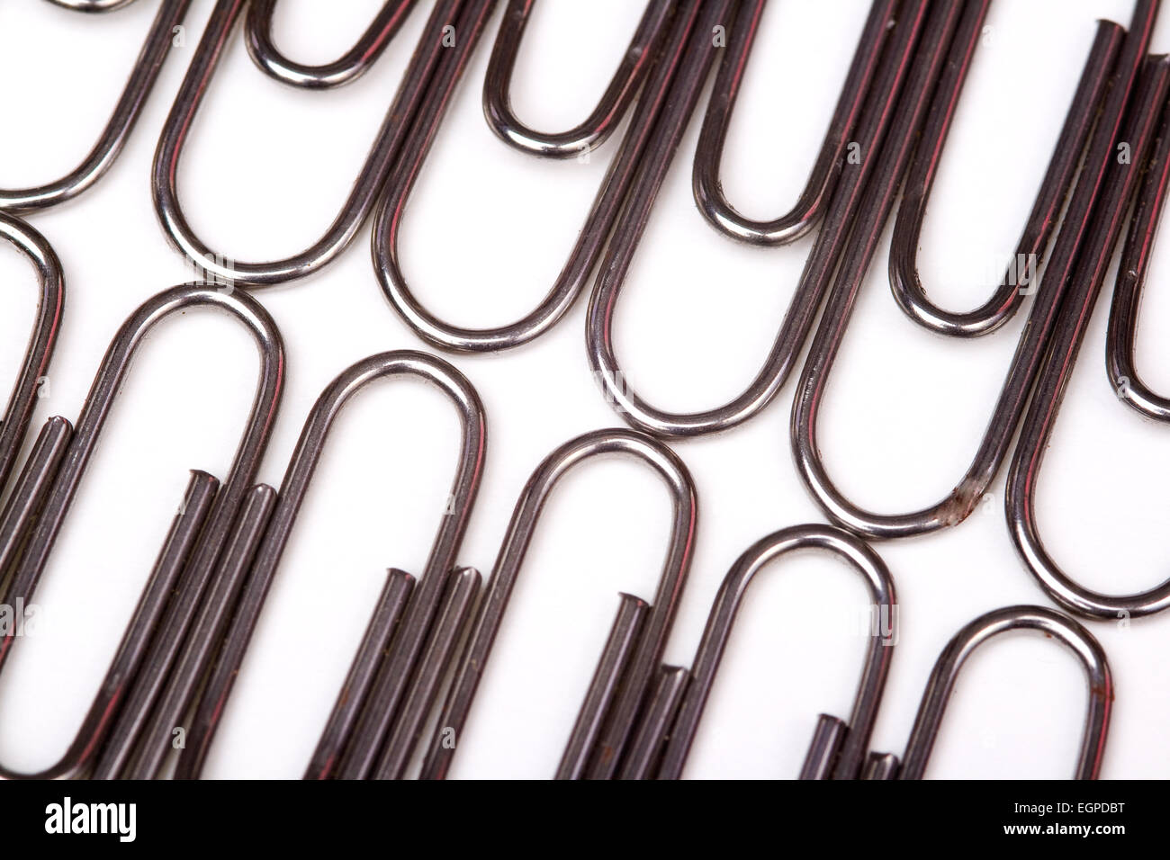 A metal paperclip on a white background Stock Photo - Alamy