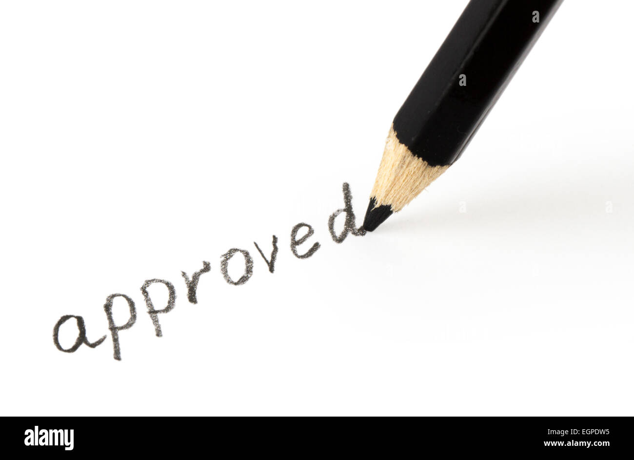 approved written in pencil on a sheet of paper Stock Photo - Alamy