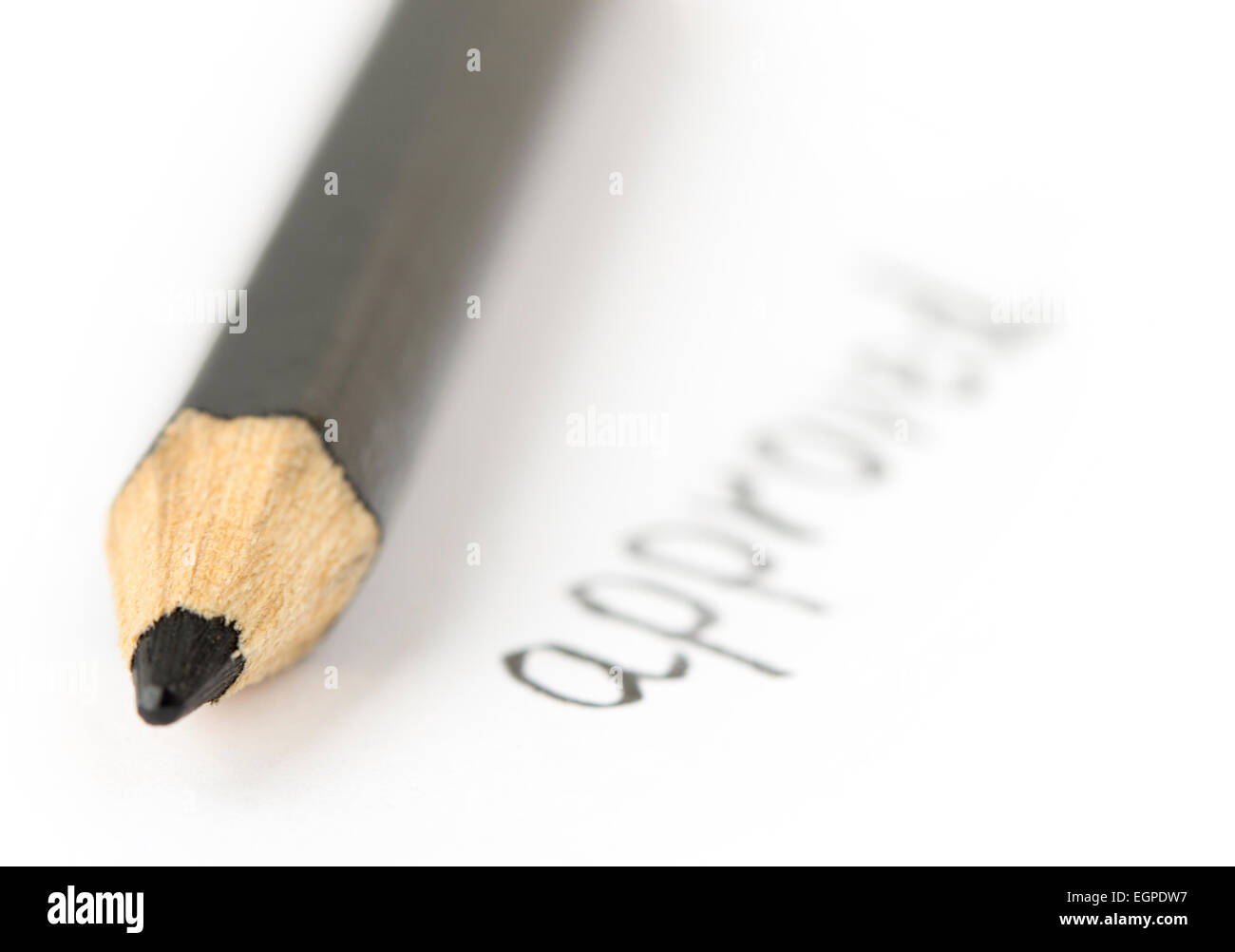 approved written in pencil on a sheet of paper Stock Photo - Alamy