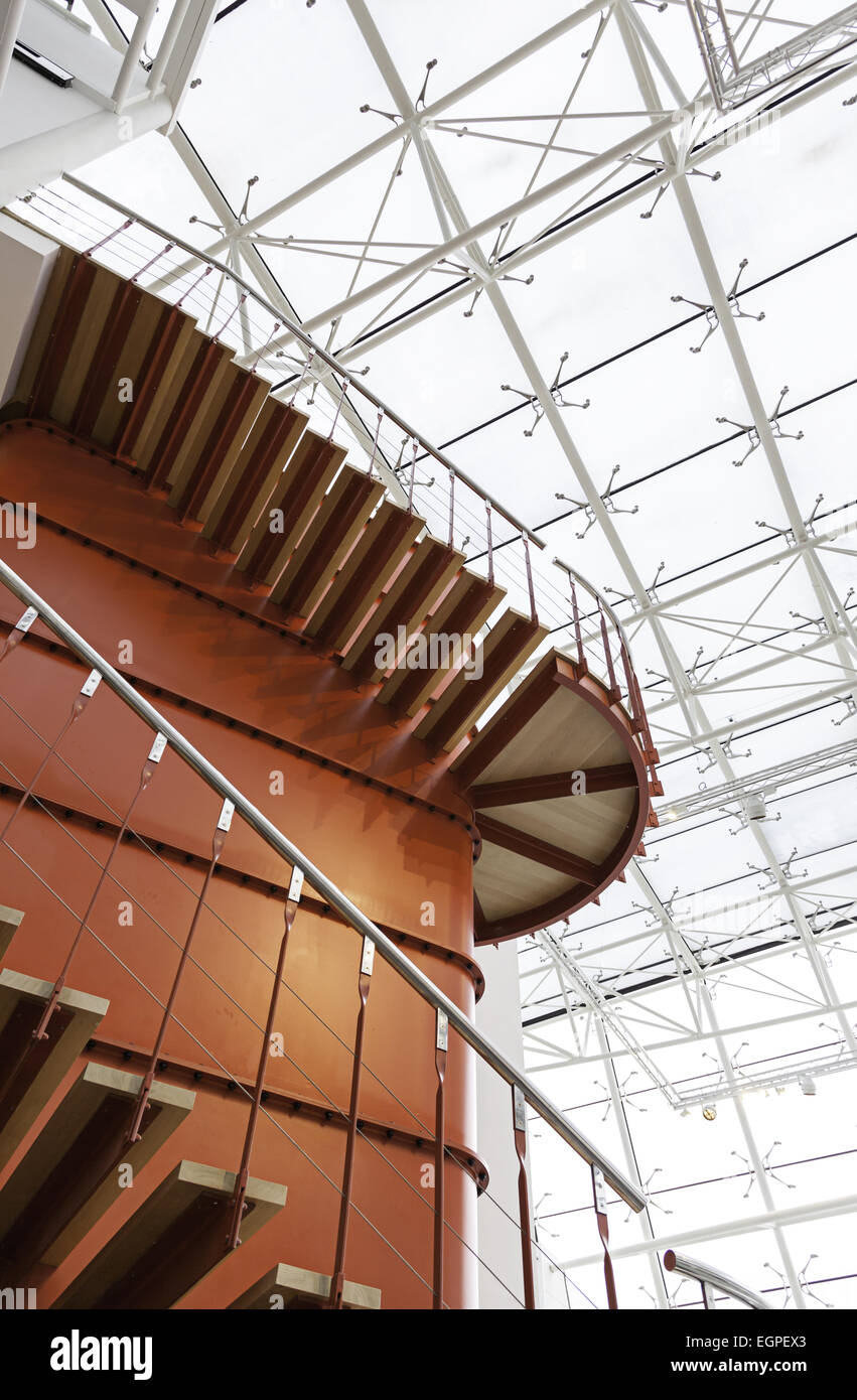 Red metal staircase, detail of a staircase inside an industrial ...
