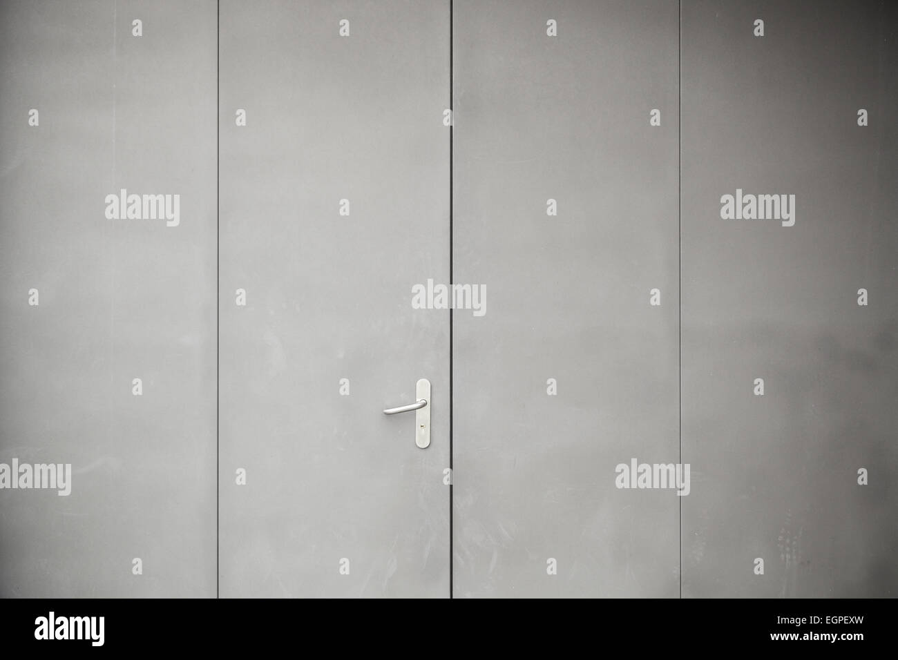 Gray metal door, detail of a closed metal door painted gray steel ...