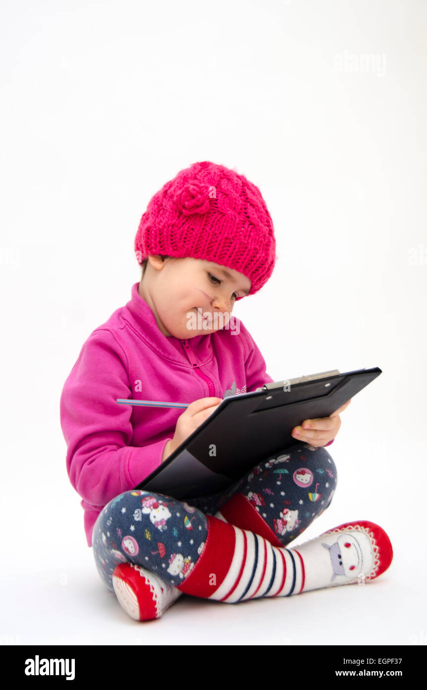 Little happy girl drawing isolated on white background Stock Photo - Alamy