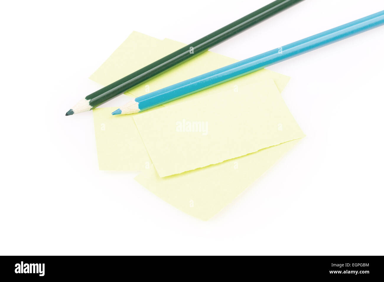 two colored pencil on a piece of paper Stock Photo - Alamy