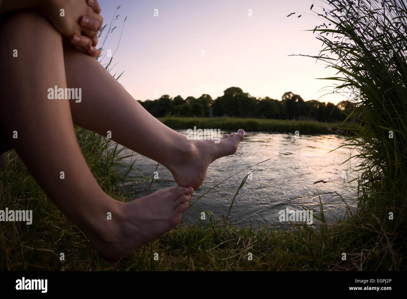 Wide Angle View of Female Legs at a River in a City Park Stock Photo ...