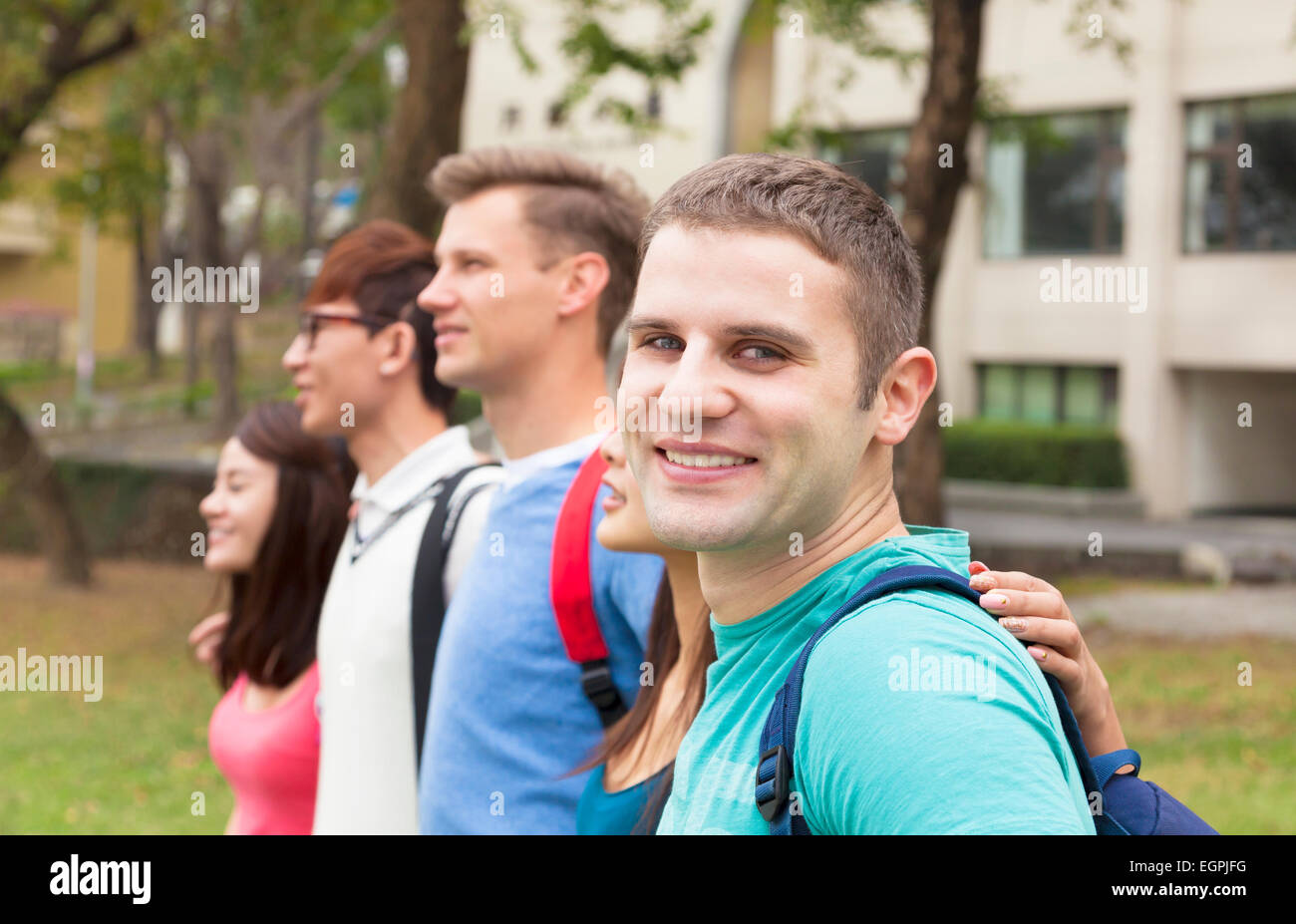 Happy group of students standing together Stock Photo - Alamy
