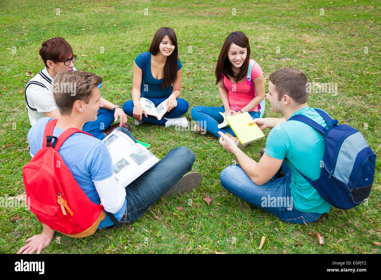 College students studying and discuss together in campus Stock Photo ...