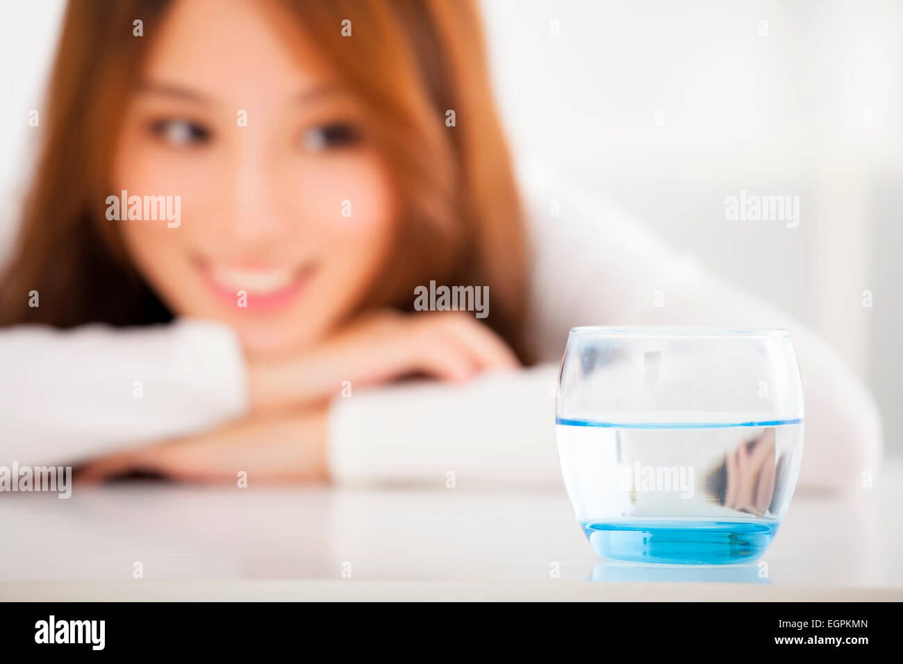 young smiling woman watching the clean water Stock Photo - Alamy