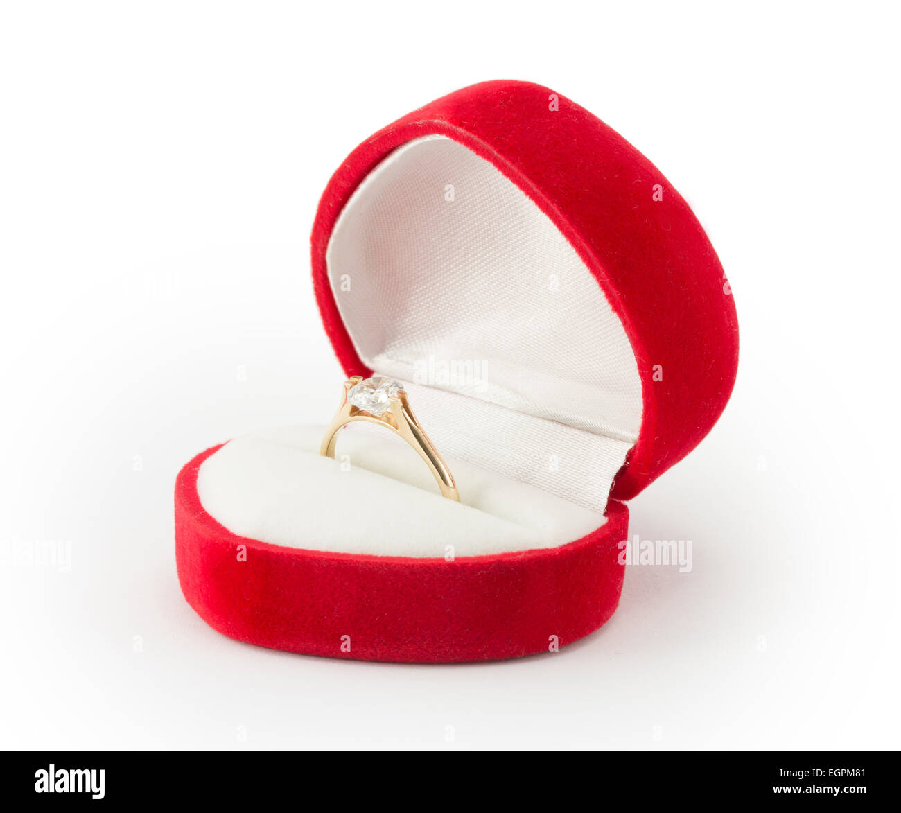 gold wedding ring in a red gift box Stock Photo - Alamy