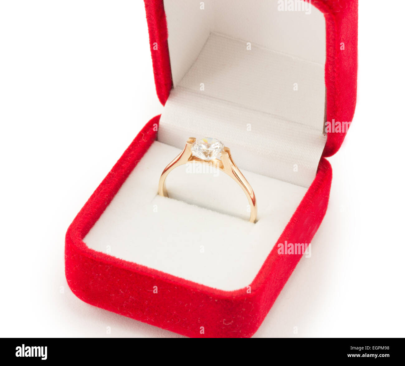 gold wedding ring in a red gift box Stock Photo - Alamy