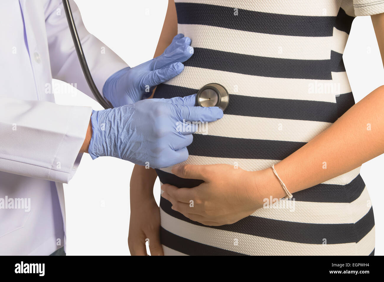 Doctor Giving Health Check To Pregnant Woman Stock Photo - Alamy