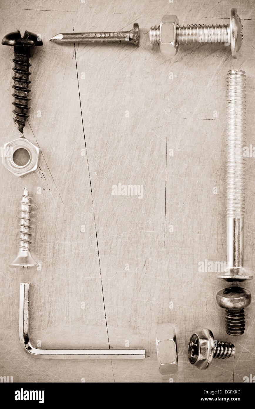 bolts and nuts tool at metal background texture Stock Photo - Alamy
