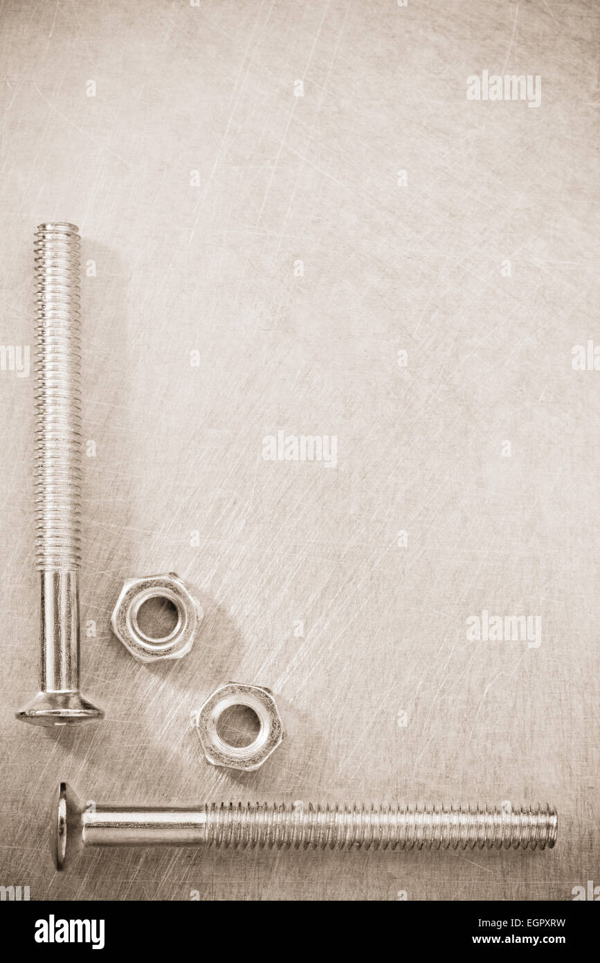 bolt tool at metal background texture Stock Photo - Alamy