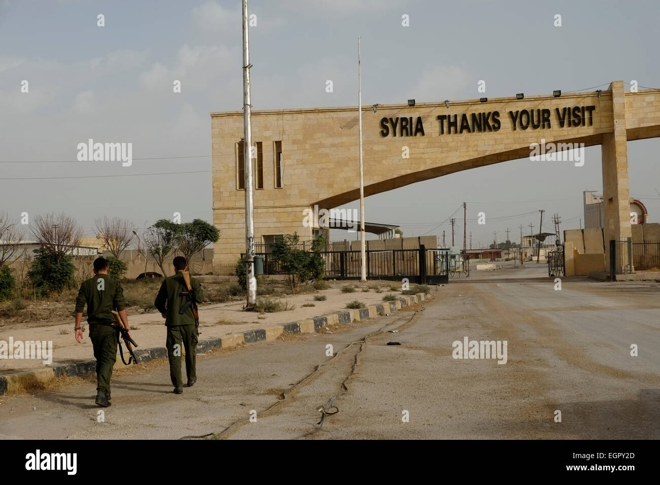 Fighters of the Kurdish People's Protection Units YPG walking at the ...