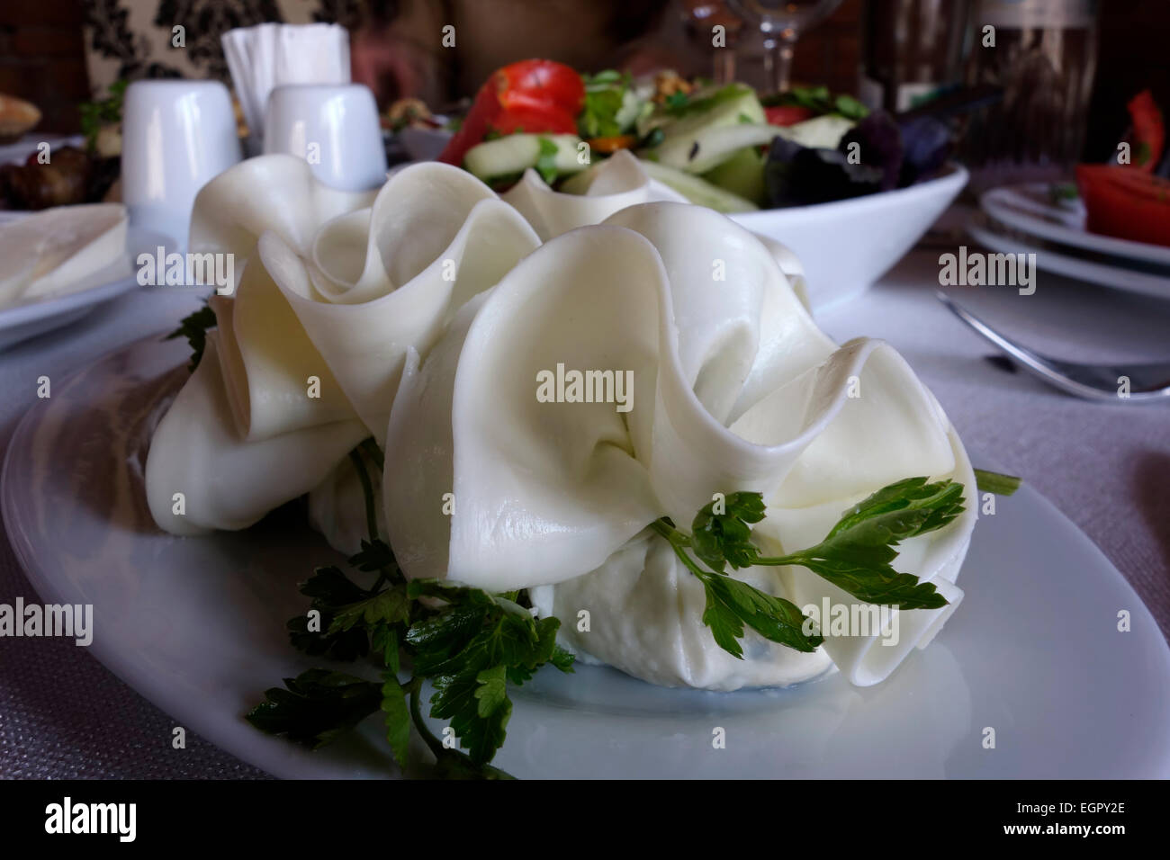 Leafs of Sulguni pickled Georgian cheese from the Samegrelo region ...