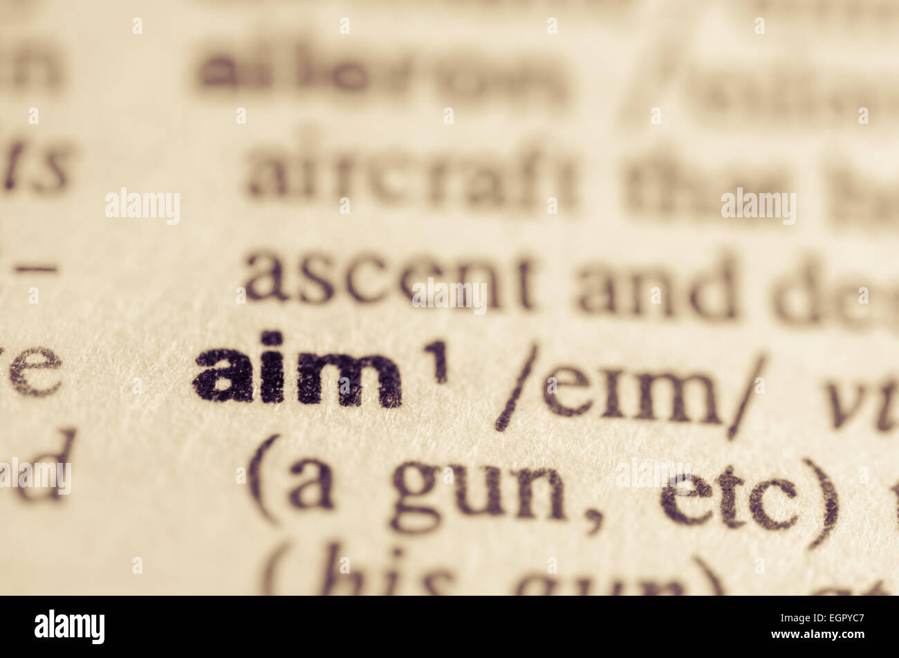 Definition of word aim in dictionary Stock Photo - Alamy