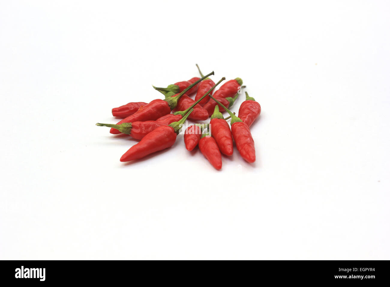 small red hot chillies in white background Stock Photo - Alamy