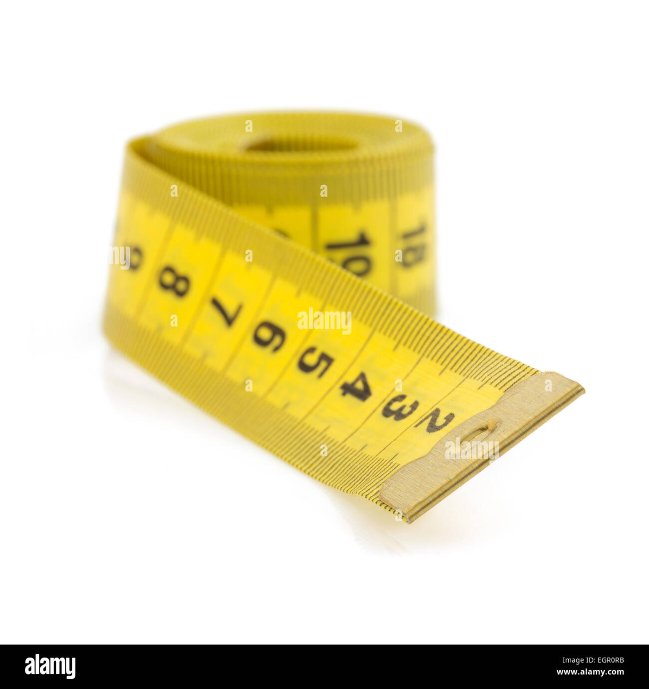 yellow measuring tape isolated on white background Stock Photo - Alamy