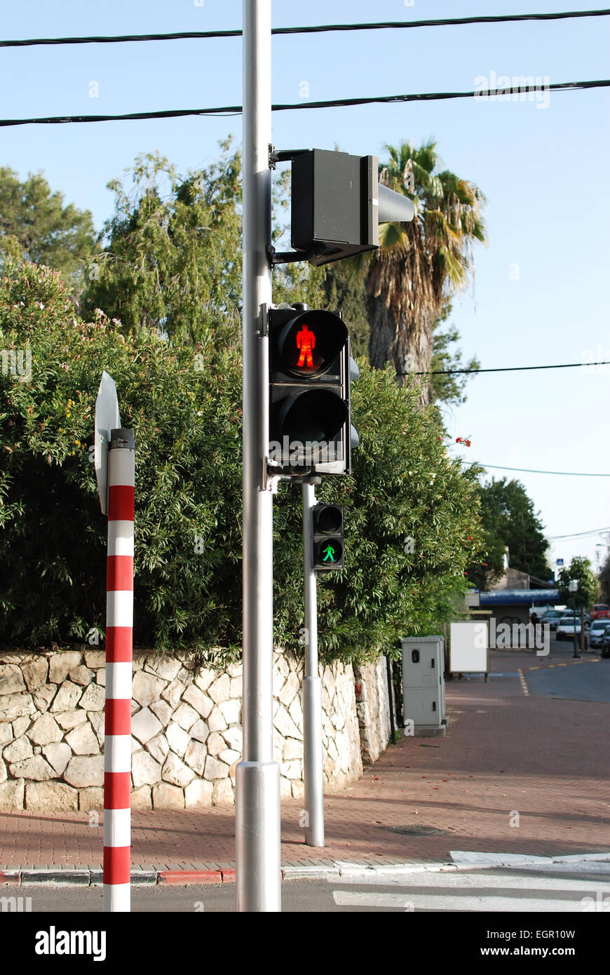 Pedestrian Traffic light red stop light in the foreground and green go ...