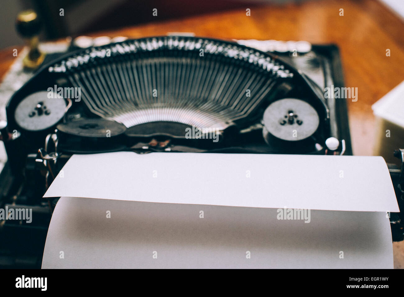 Typewriter with Blank Paper Stock Photo - Alamy