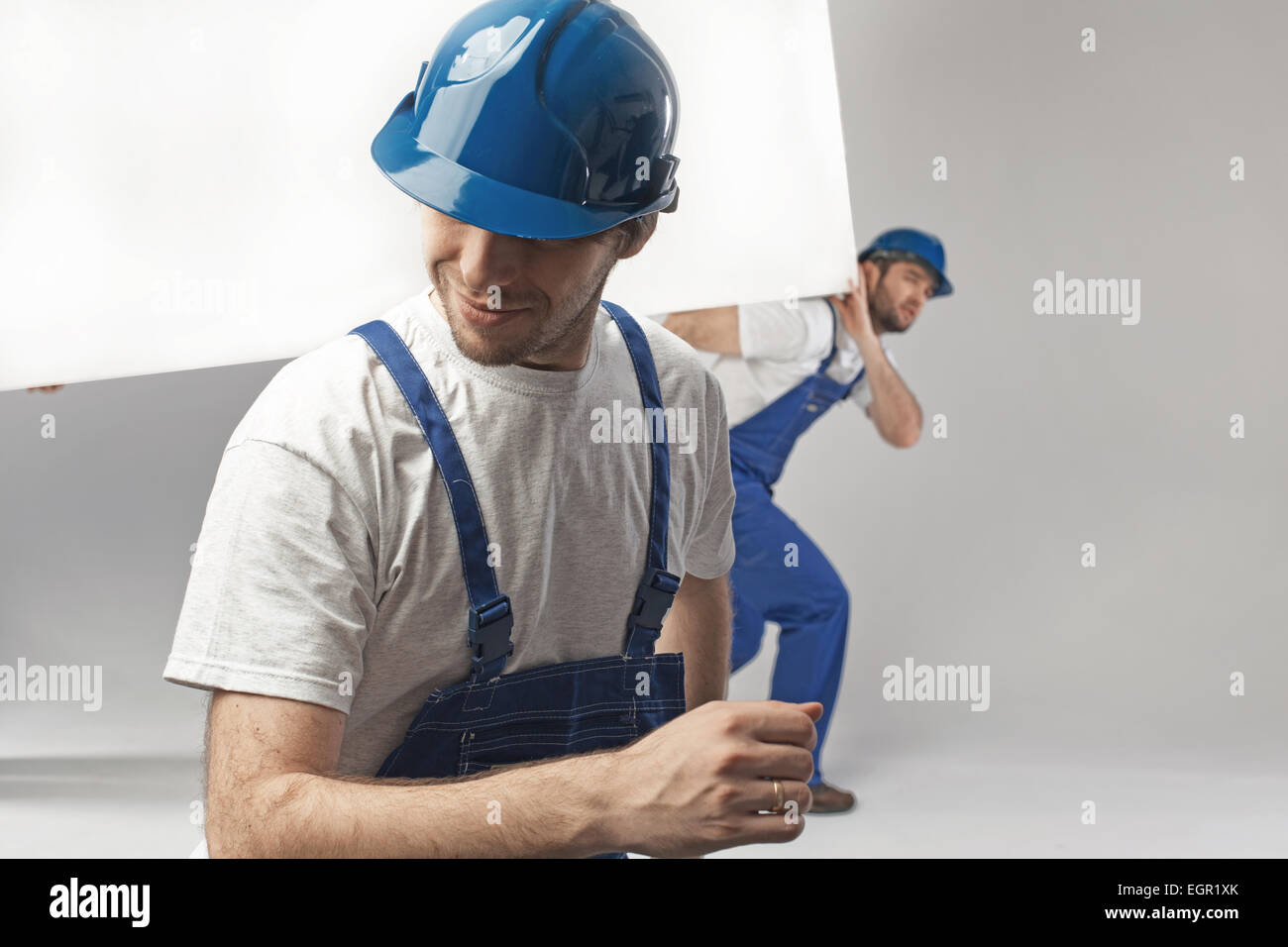 Hard-working employees during the renovation Stock Photo - Alamy
