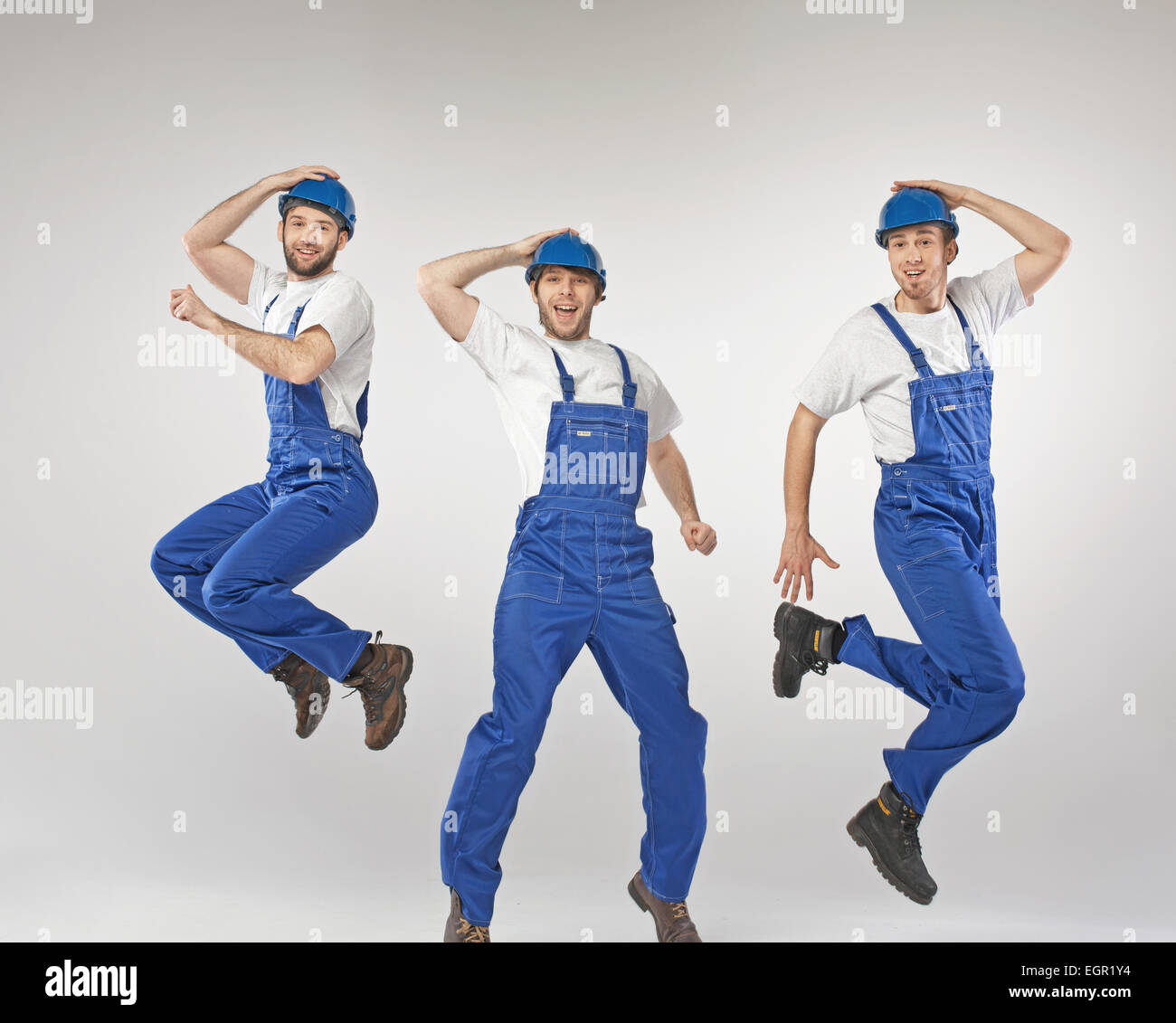 Portrait of three dancing employees Stock Photo - Alamy