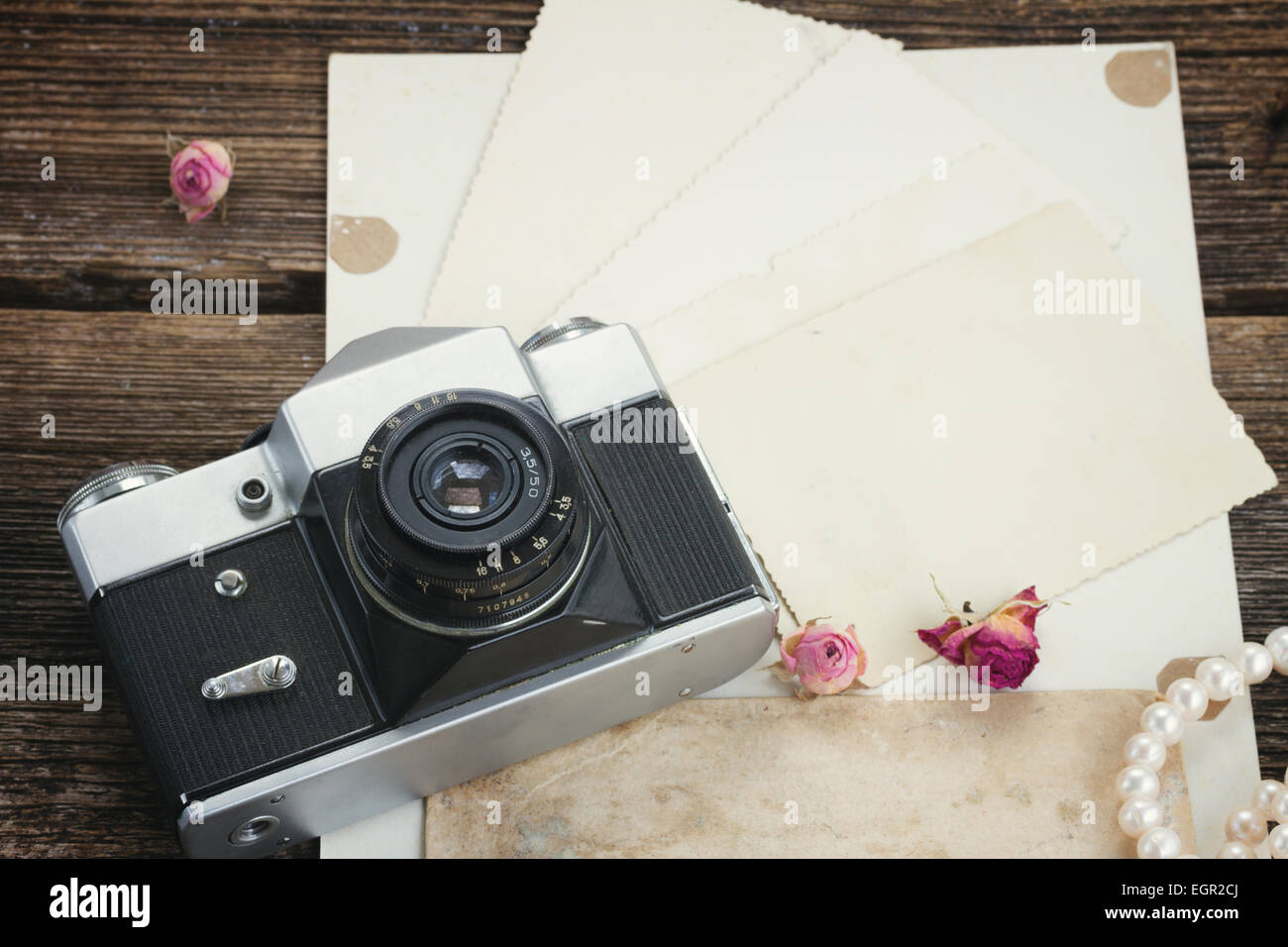 pile of old photos with frame of vintage cameras, retro toned Stock ...