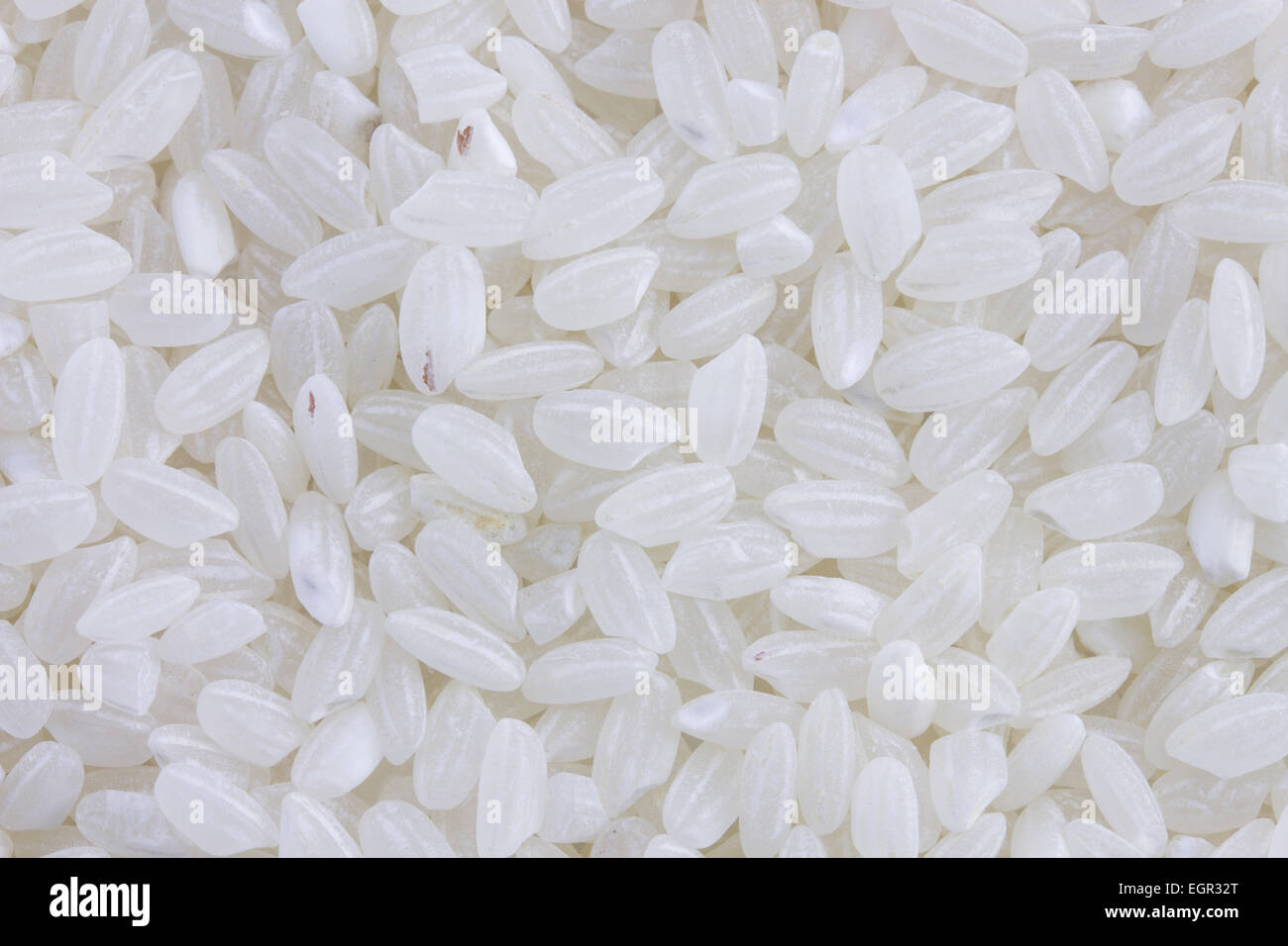 rice grains close-up background Stock Photo - Alamy