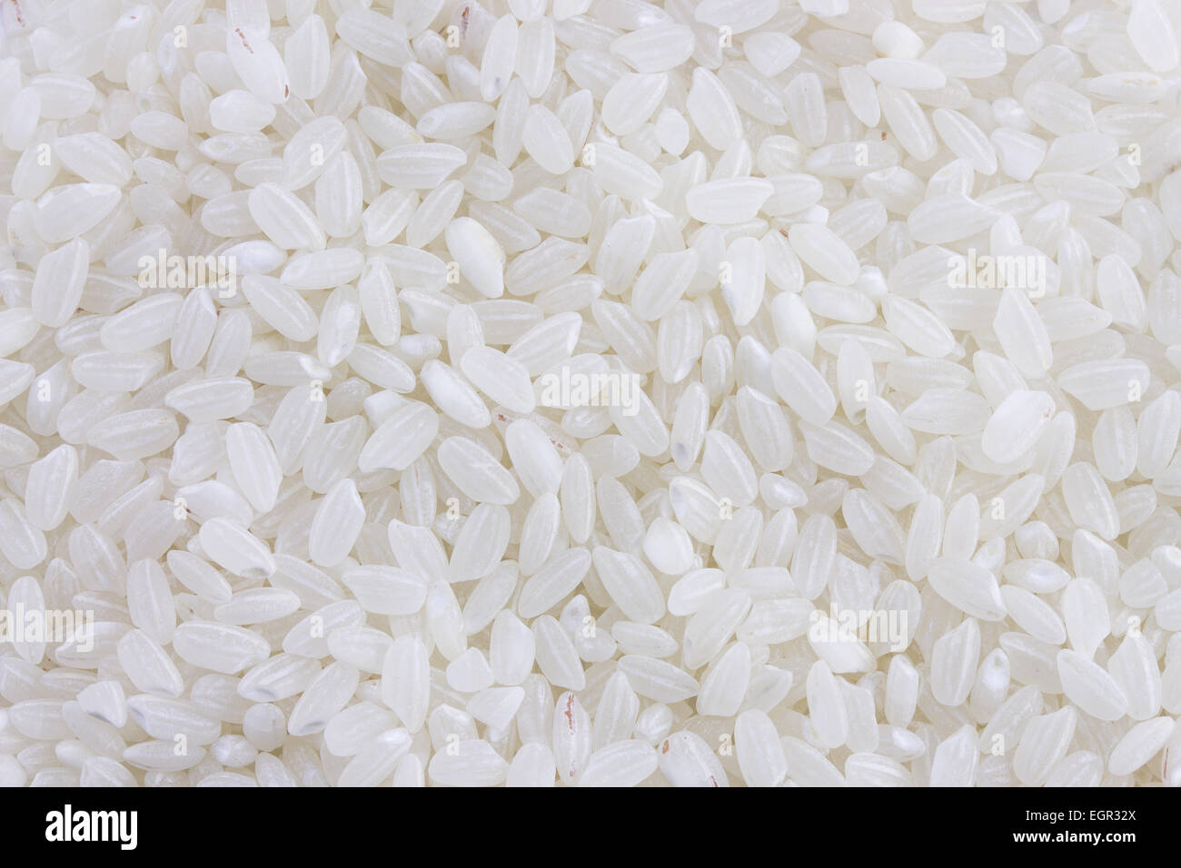 rice grains close-up background Stock Photo - Alamy