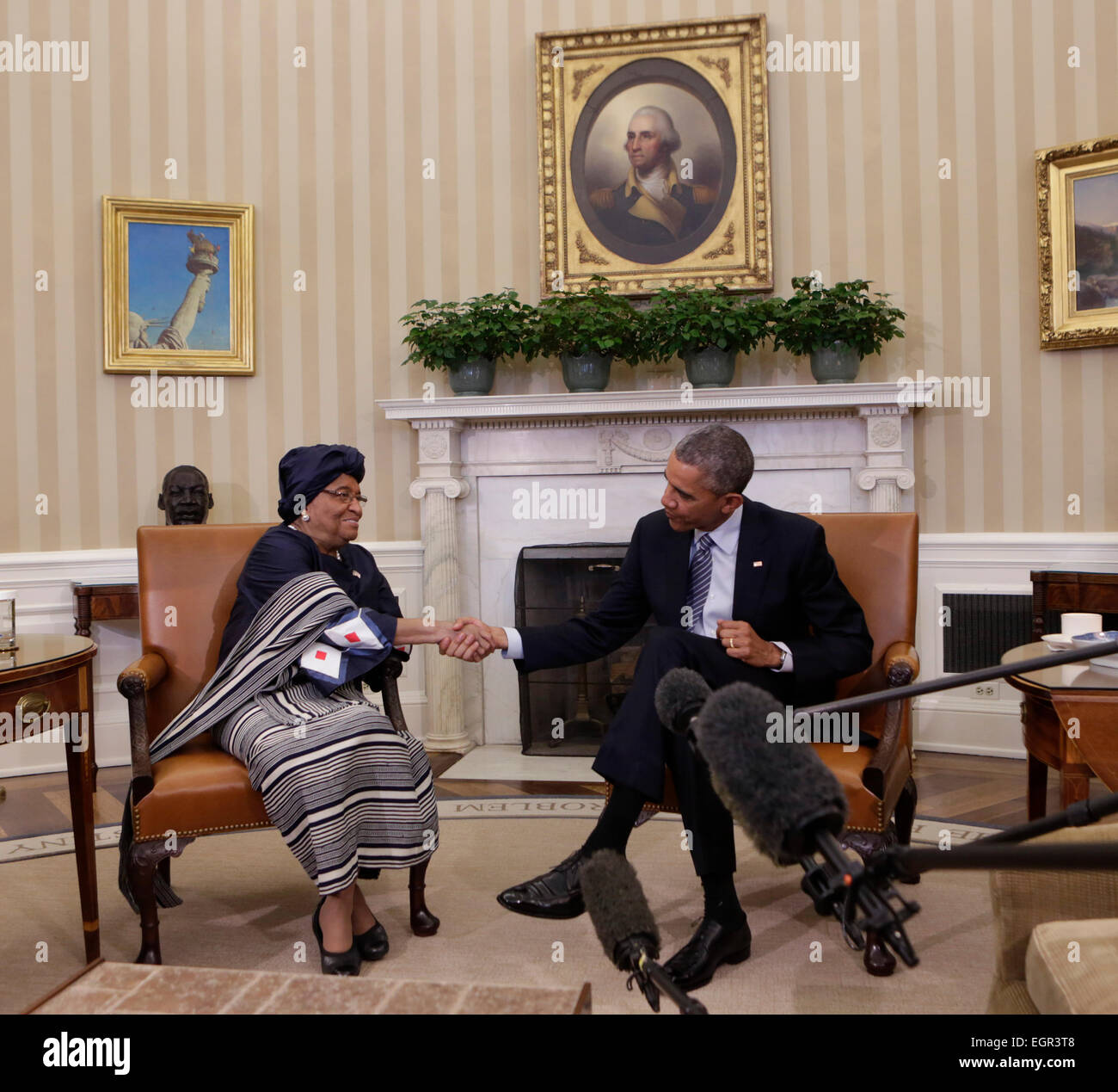 Washington, DC, USA. 27th Feb, 2015. US President Barack Obama (R) and ...