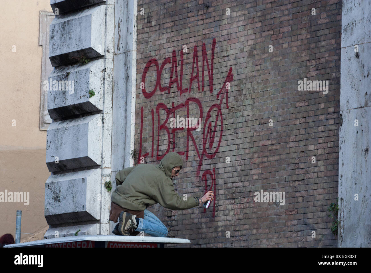 A protester made a graffiti to express his protest against Matteo ...