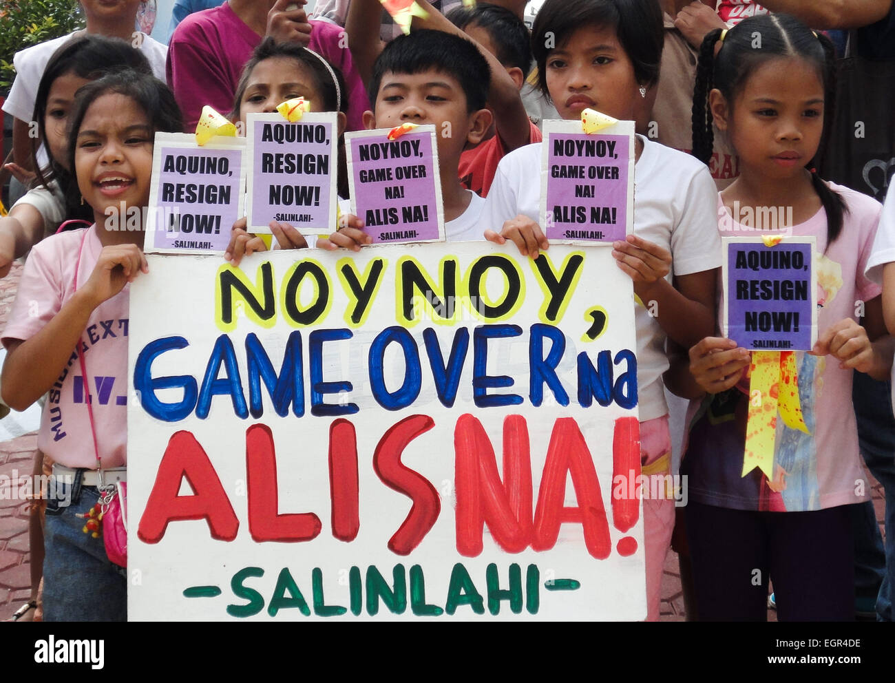 Filipino youth protesters hold placards calling for the resignation of ...