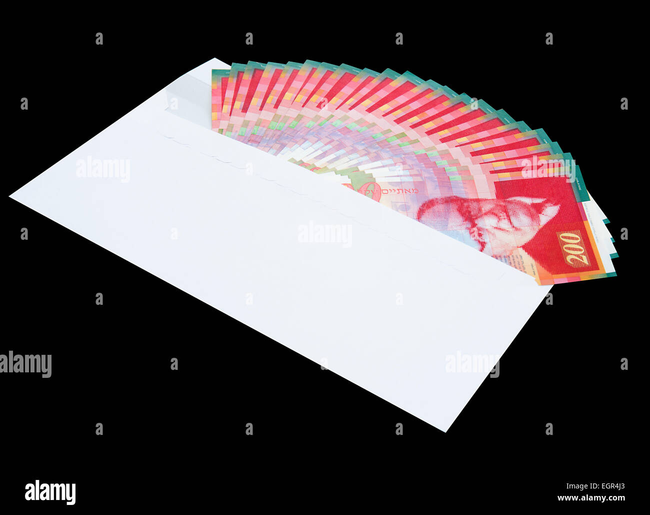 White envelope with bank notes, bills of NIS200 on a black background ...