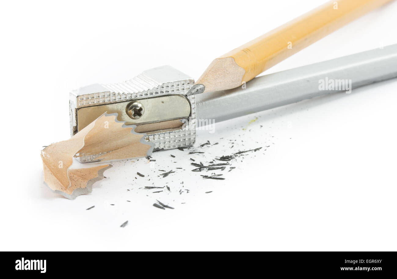 sharp pencil and a metal sharpener on a white background Stock Photo ...