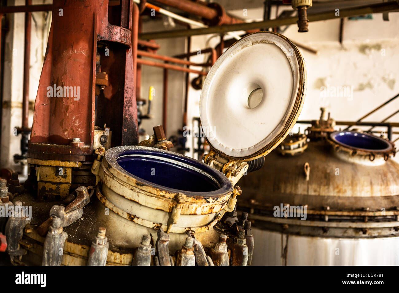 Industrial interior with storage tank Stock Photo - Alamy