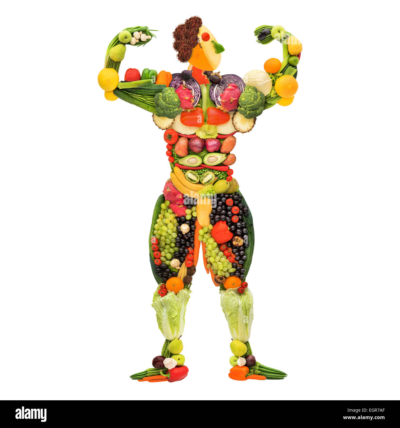 Fruits and vegetables in the shape of a healthy posing muscular ...