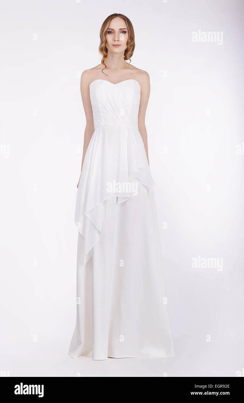 Fashion Model Standing in Long White Dress Stock Photo - Alamy