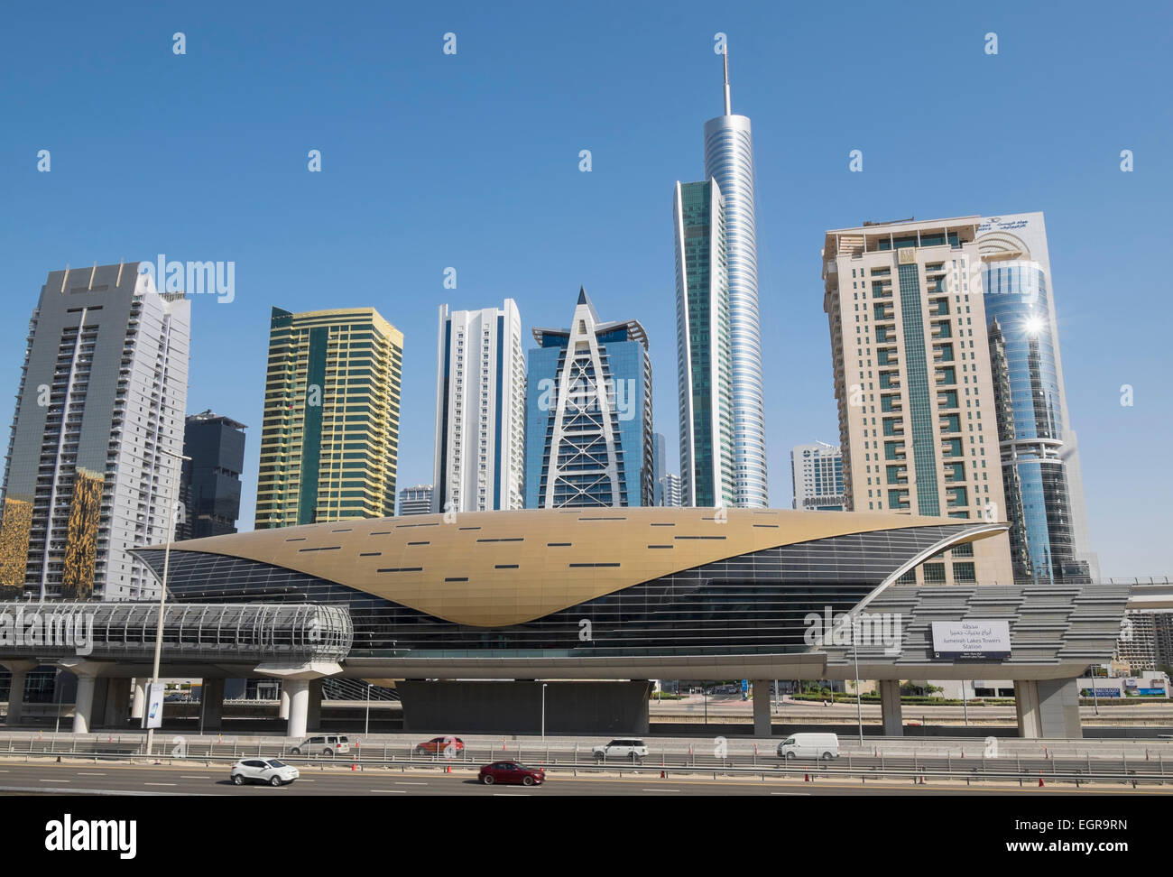 Metro station and skyscrapers at Jumeirah Lakes Towers (JLT) in Dubai ...
