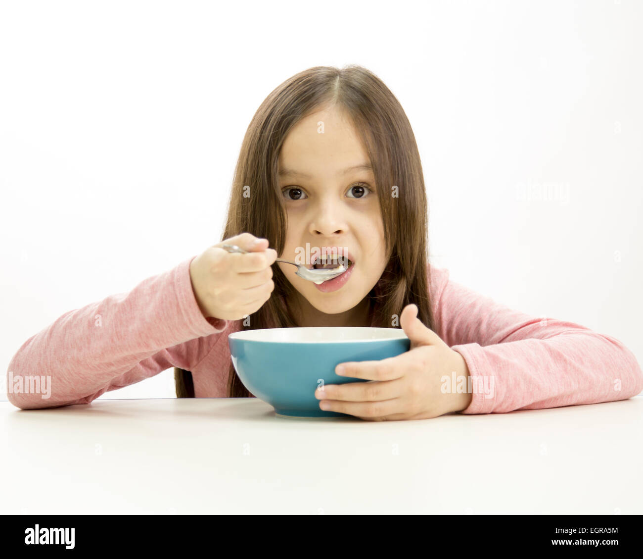 Asian girl eating breakfast hi-res stock photography and images - Alamy