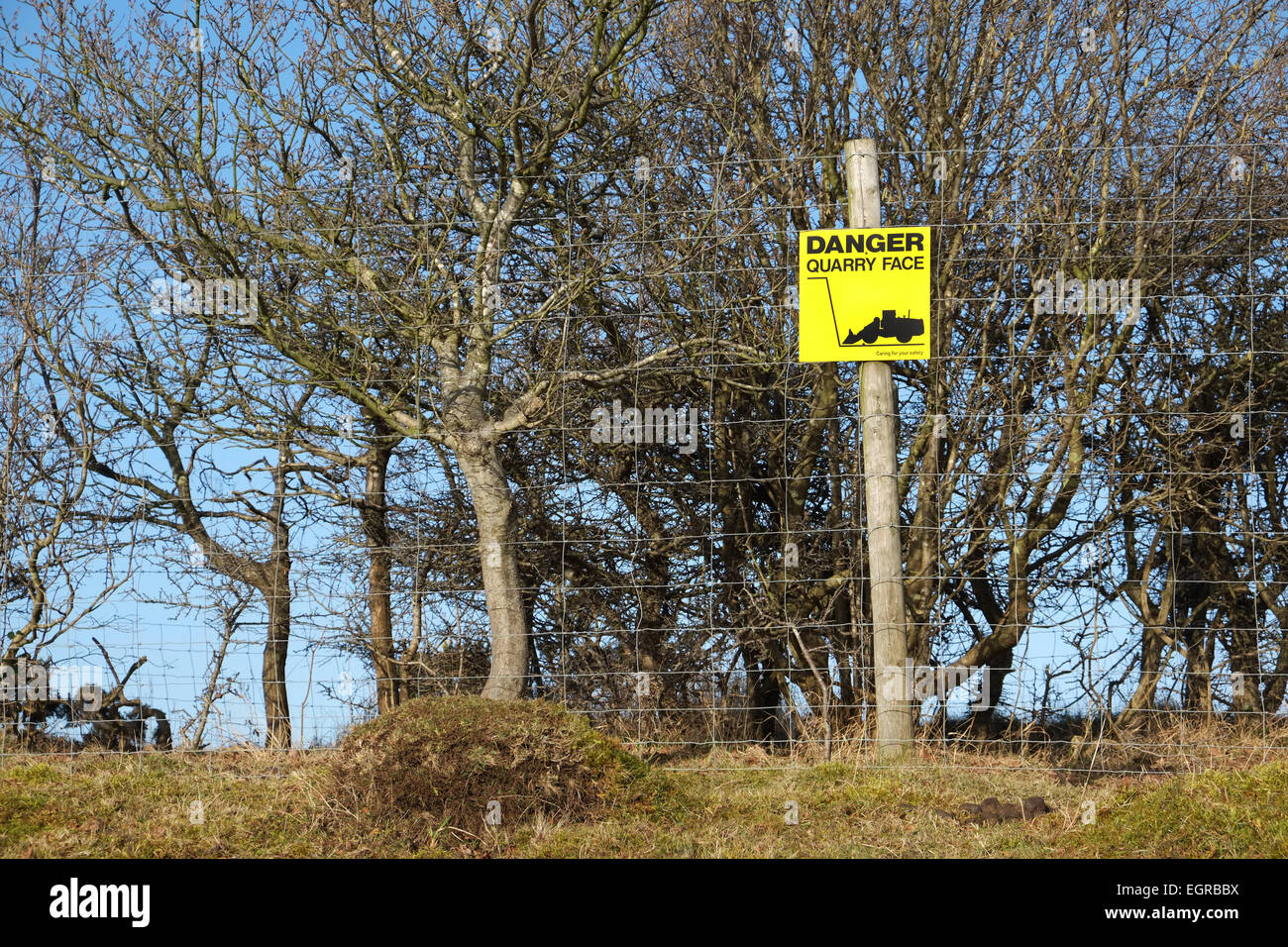 Signs to warn of a dangerous quarry face 1 March 2015 Stock Photo - Alamy