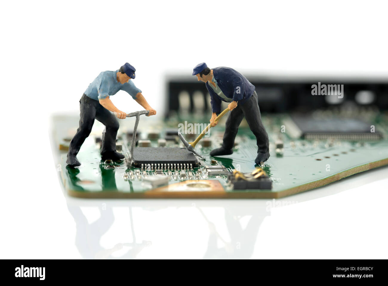 two man repair chips on computer motherboard Stock Photo - Alamy