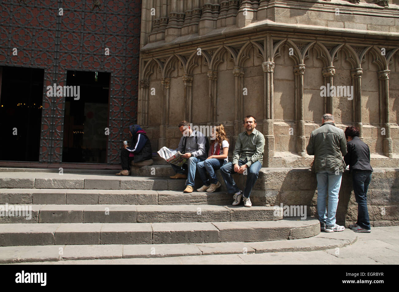 Tourists and beggar outside entrance to Santa Maria del Mar Church, La ...