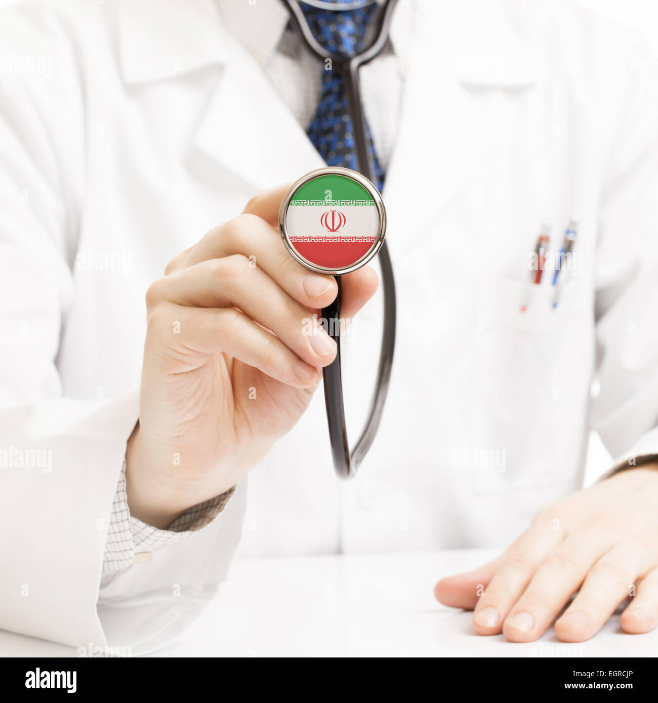 Doctor holding stethoscope with flag series - Iran Stock Photo - Alamy