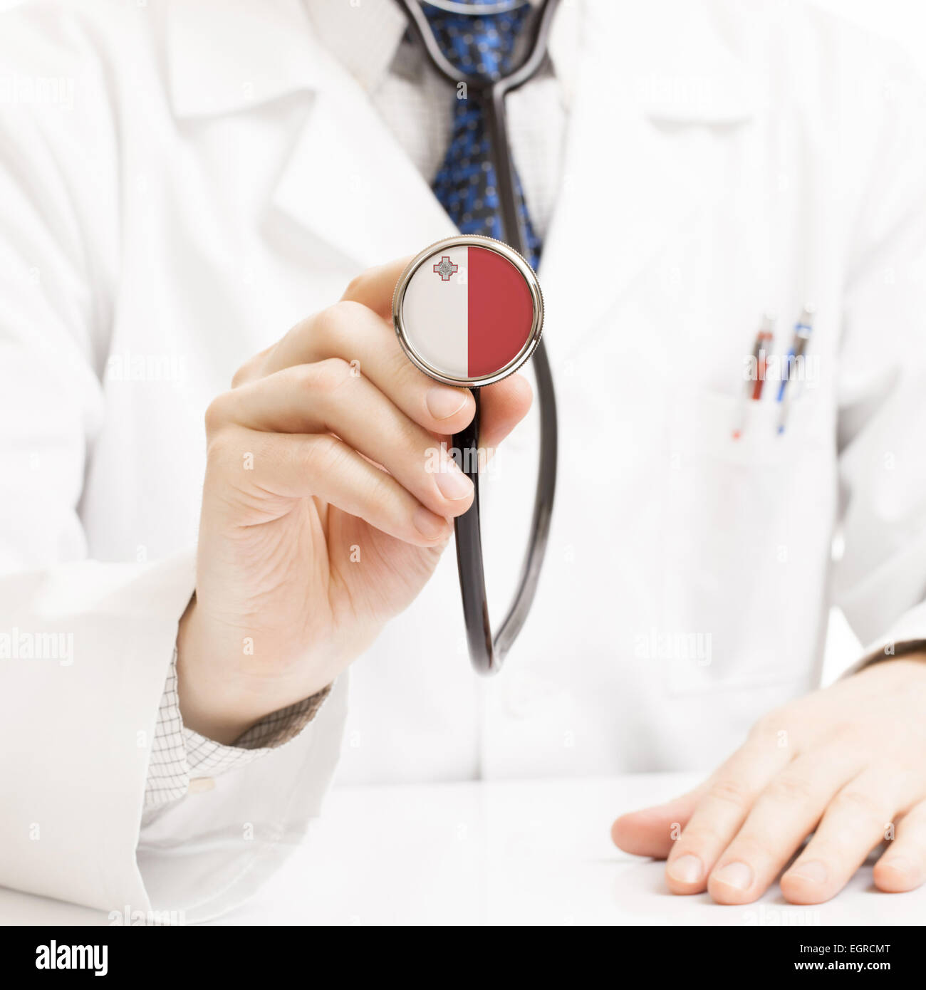 Doctor holding stethoscope with flag series - Malta Stock Photo - Alamy
