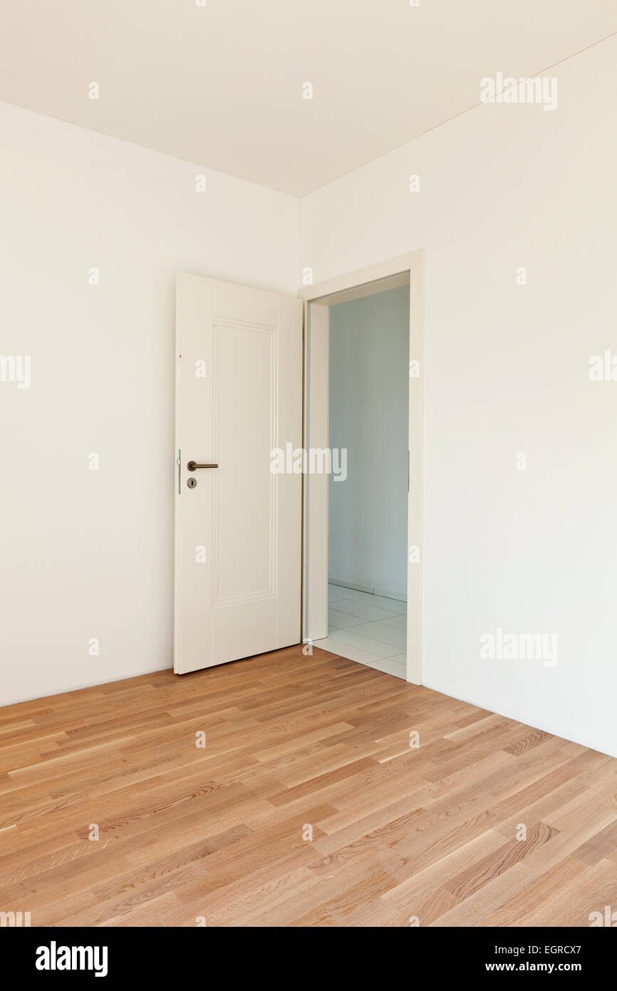 open door in a room with parquet Stock Photo - Alamy