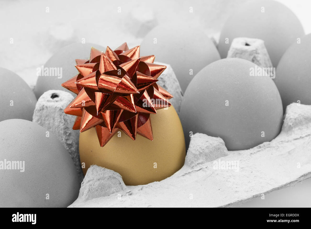 colored egg with bow Stock Photo - Alamy
